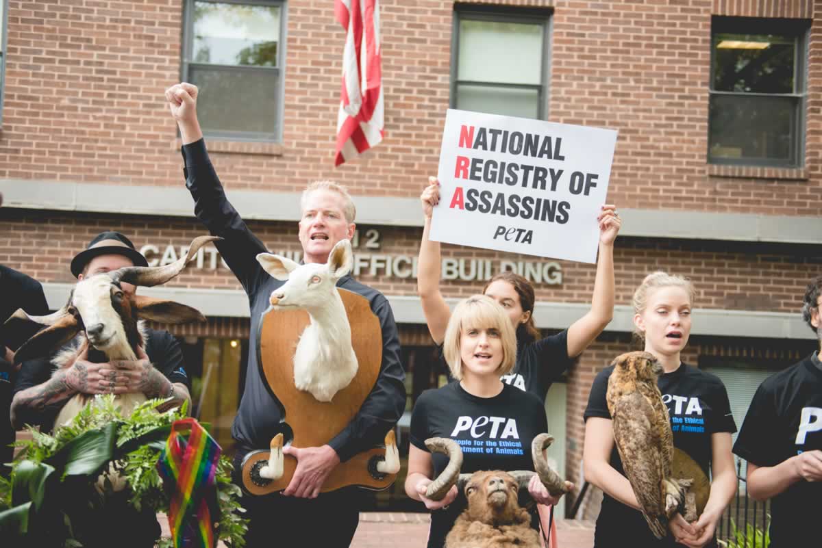 Gay PETA Vice President Leads Protest of All Gun Violence at NRA | PETA