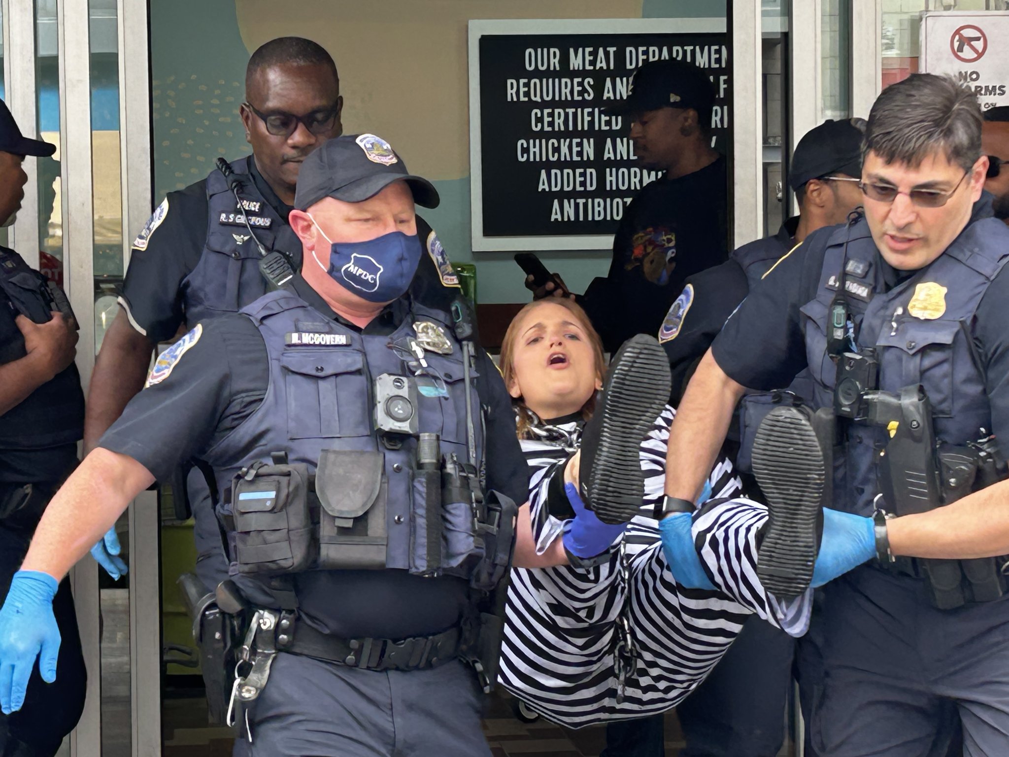 PETA Members Arrested During Protest at Whole Foods | Photos